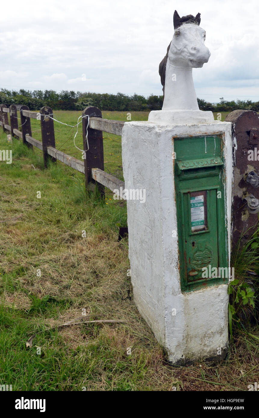 Post box with horses head Stock Photo - Alamy