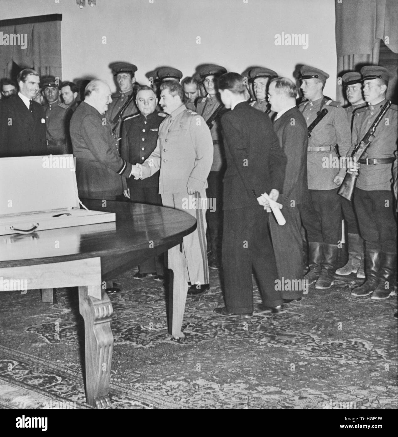 Churchill shaking hands with Stalin at the Teheran Conference. Eden and ...