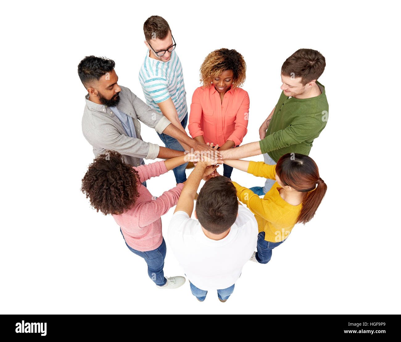 Hands together multiracial top view Cut Out Stock Images & Pictures - Alamy
