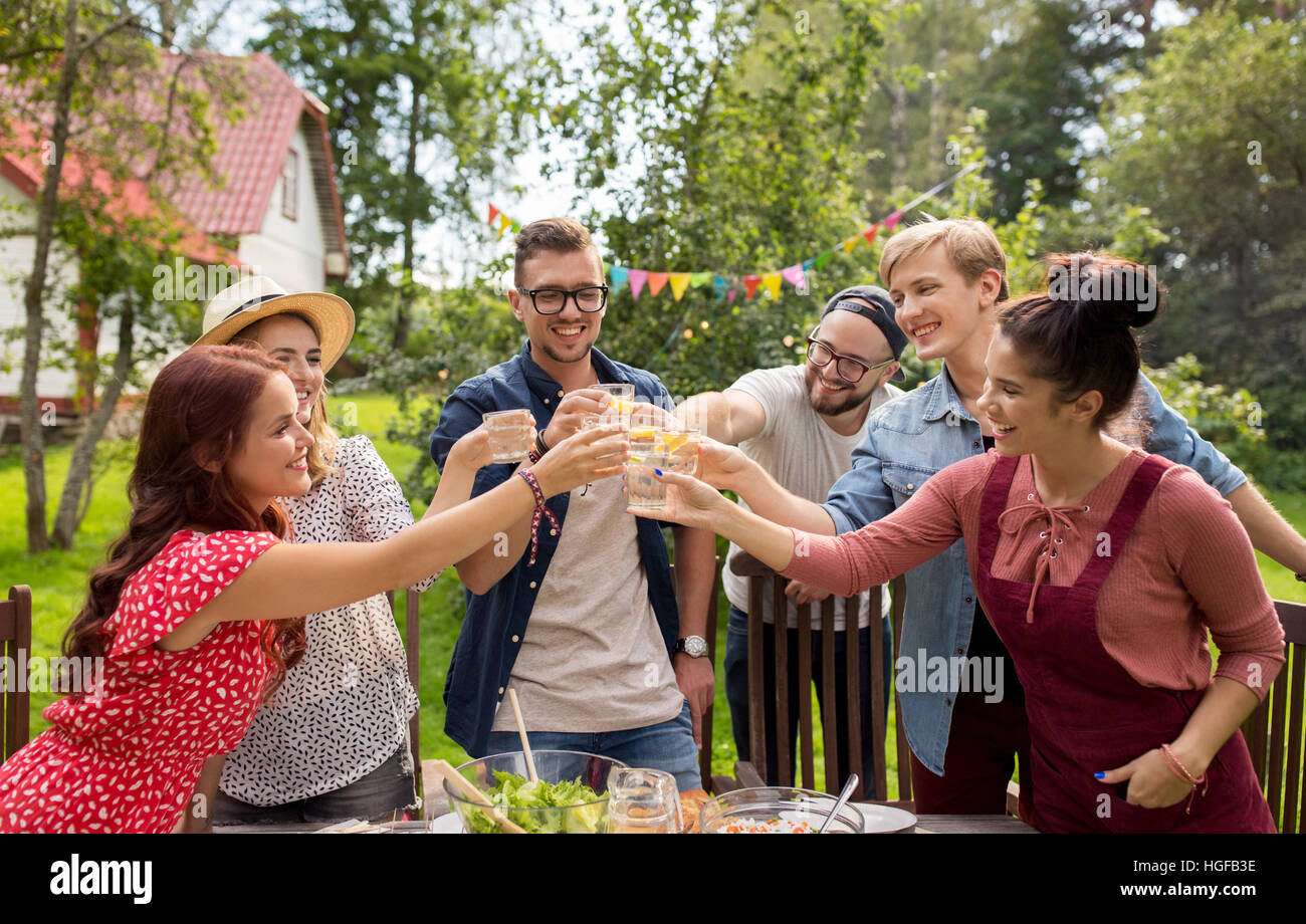 happy friends having party at summer garden Stock Photo - Alamy