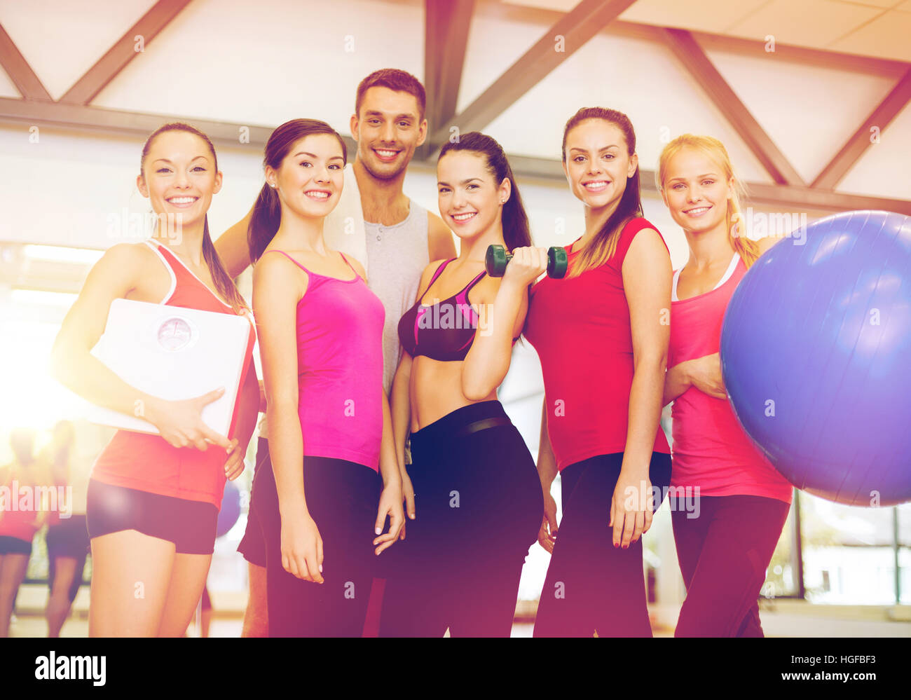 group of smiling people in the gym Stock Photo - Alamy