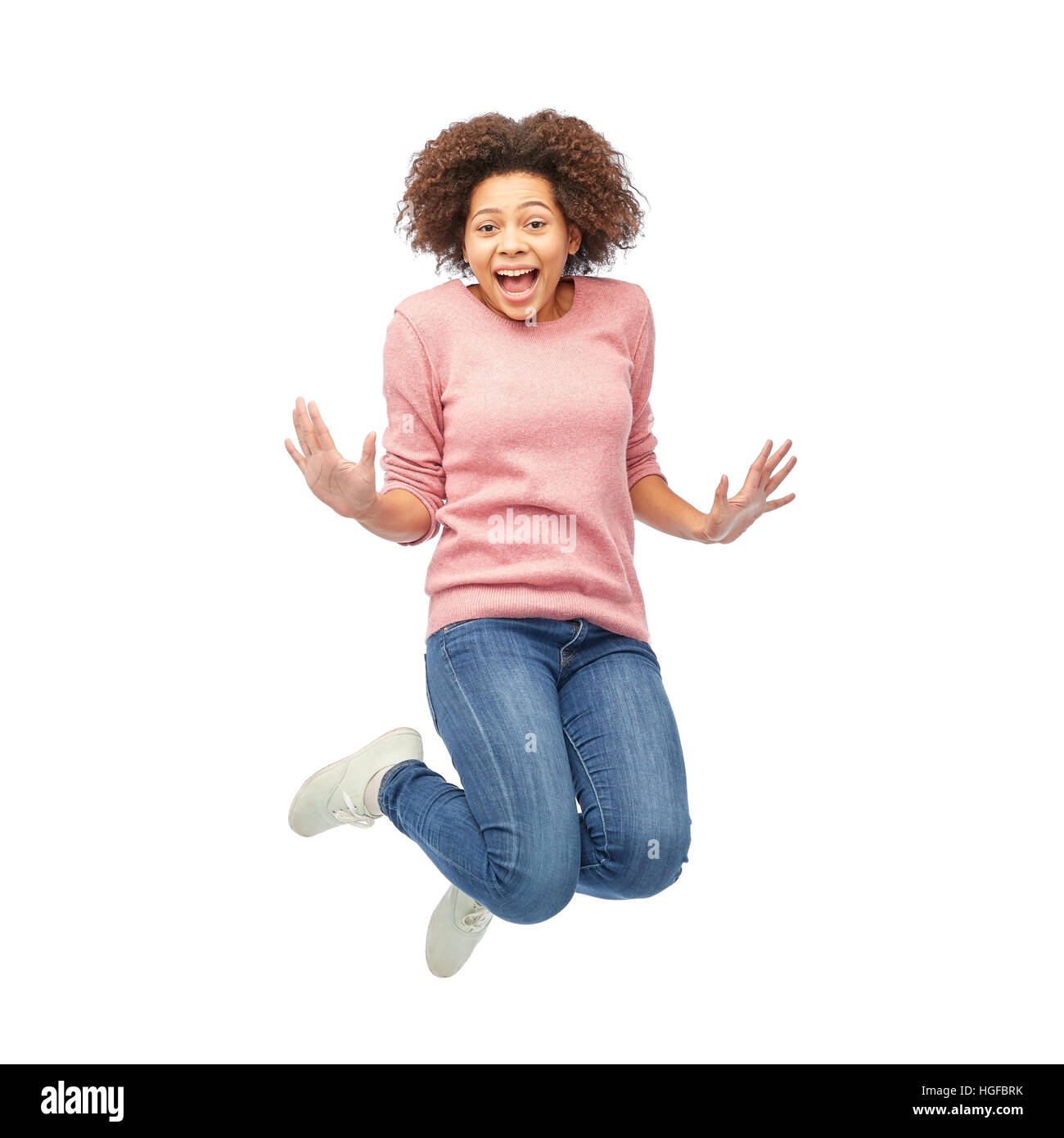 happy african american woman jumping over white Stock Photo - Alamy