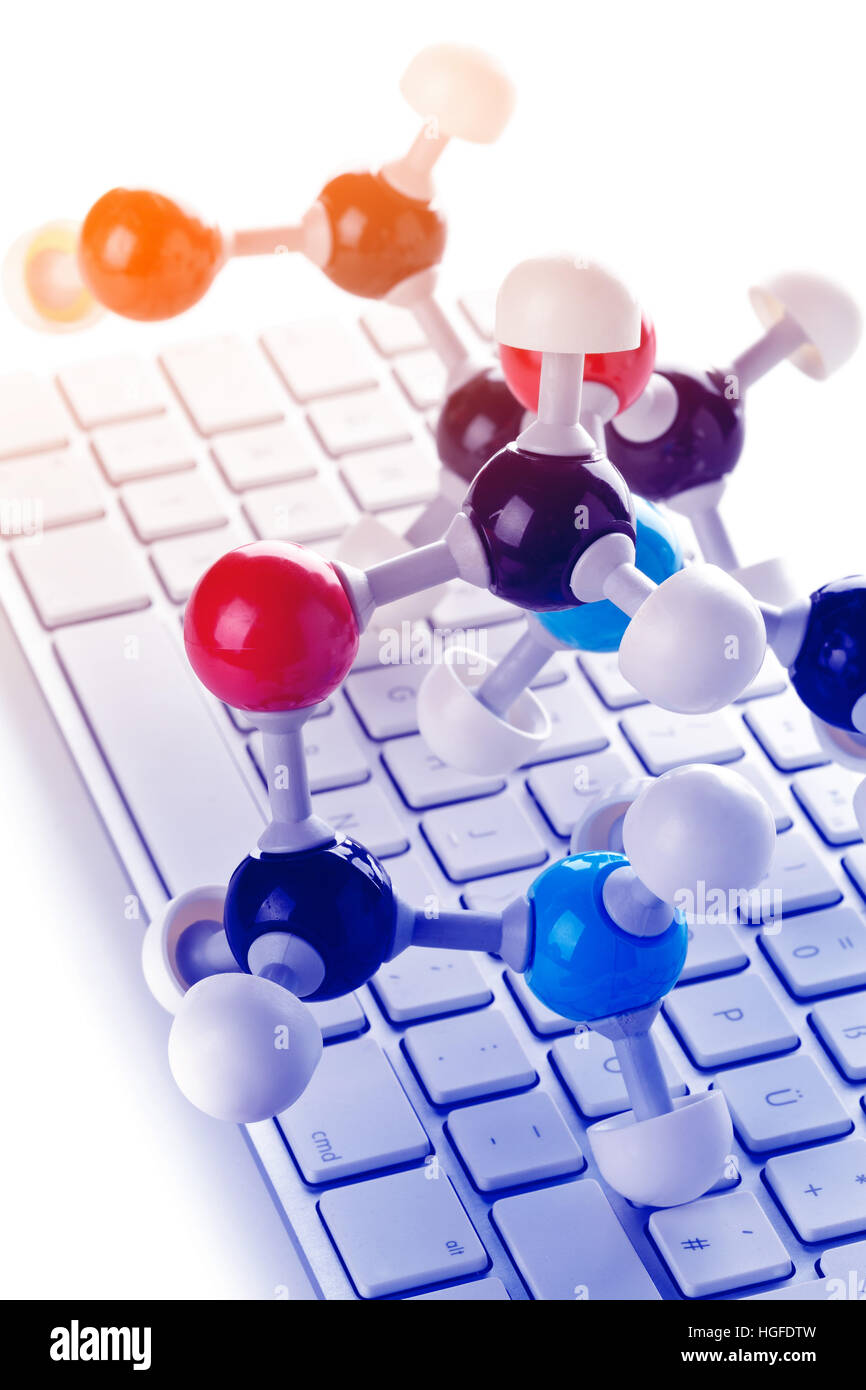 Chemical molecule model on computer keyboard. Artificial intelligence ...