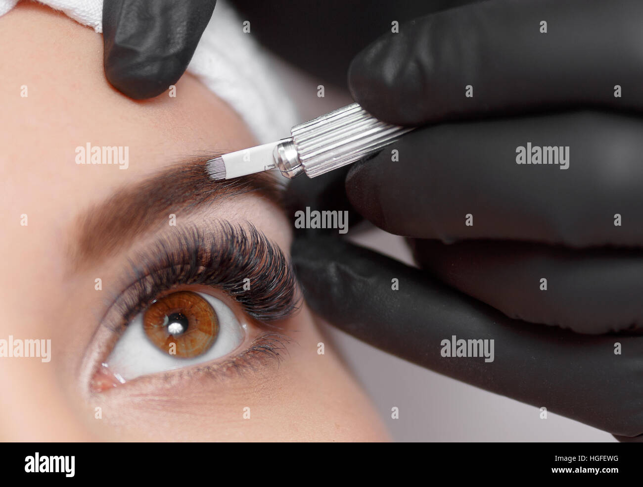Permanent makeup eyebrows Stock Photo - Alamy