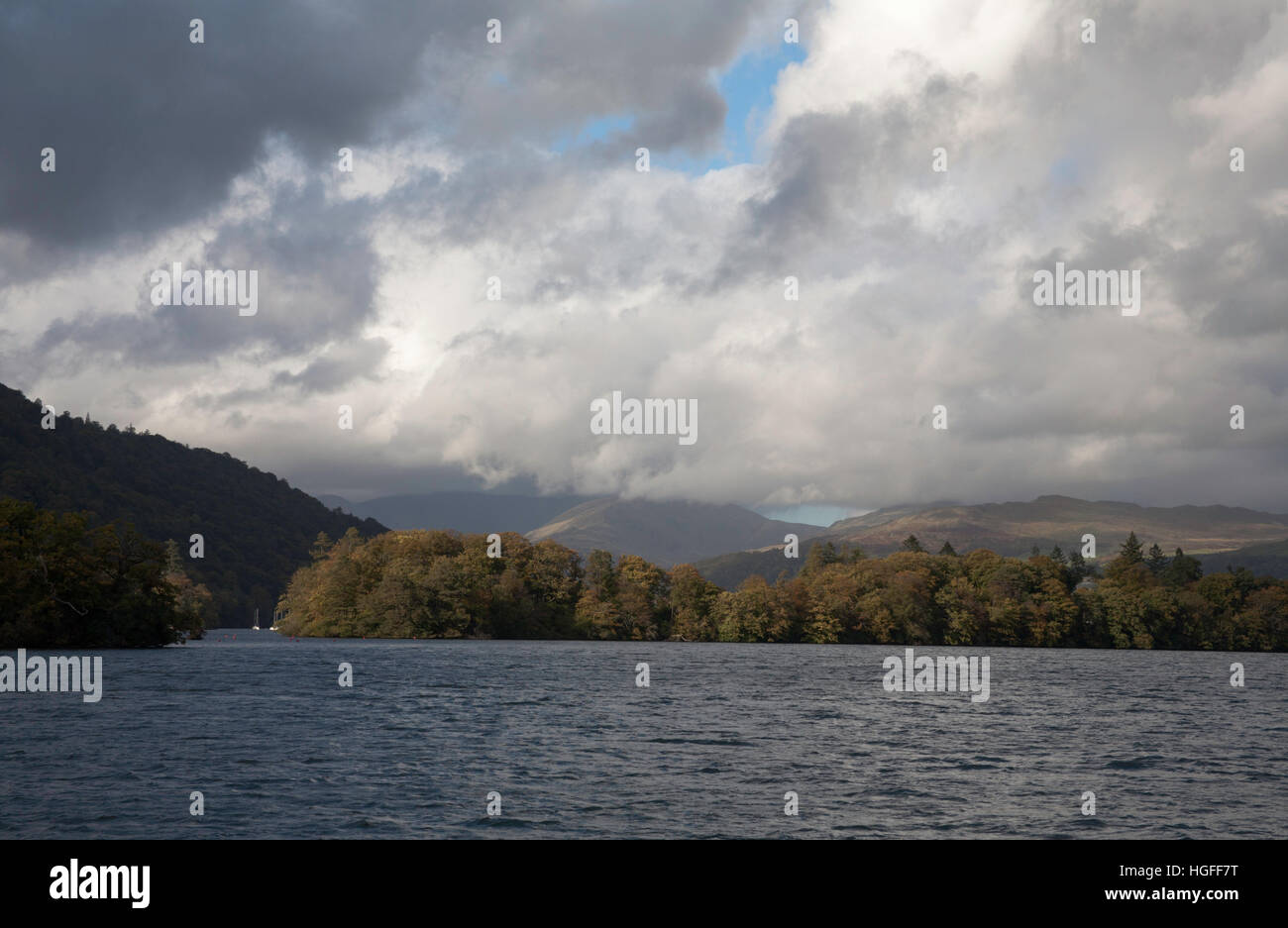 Storm clouds passing across the mountains to the north of Windermere ...
