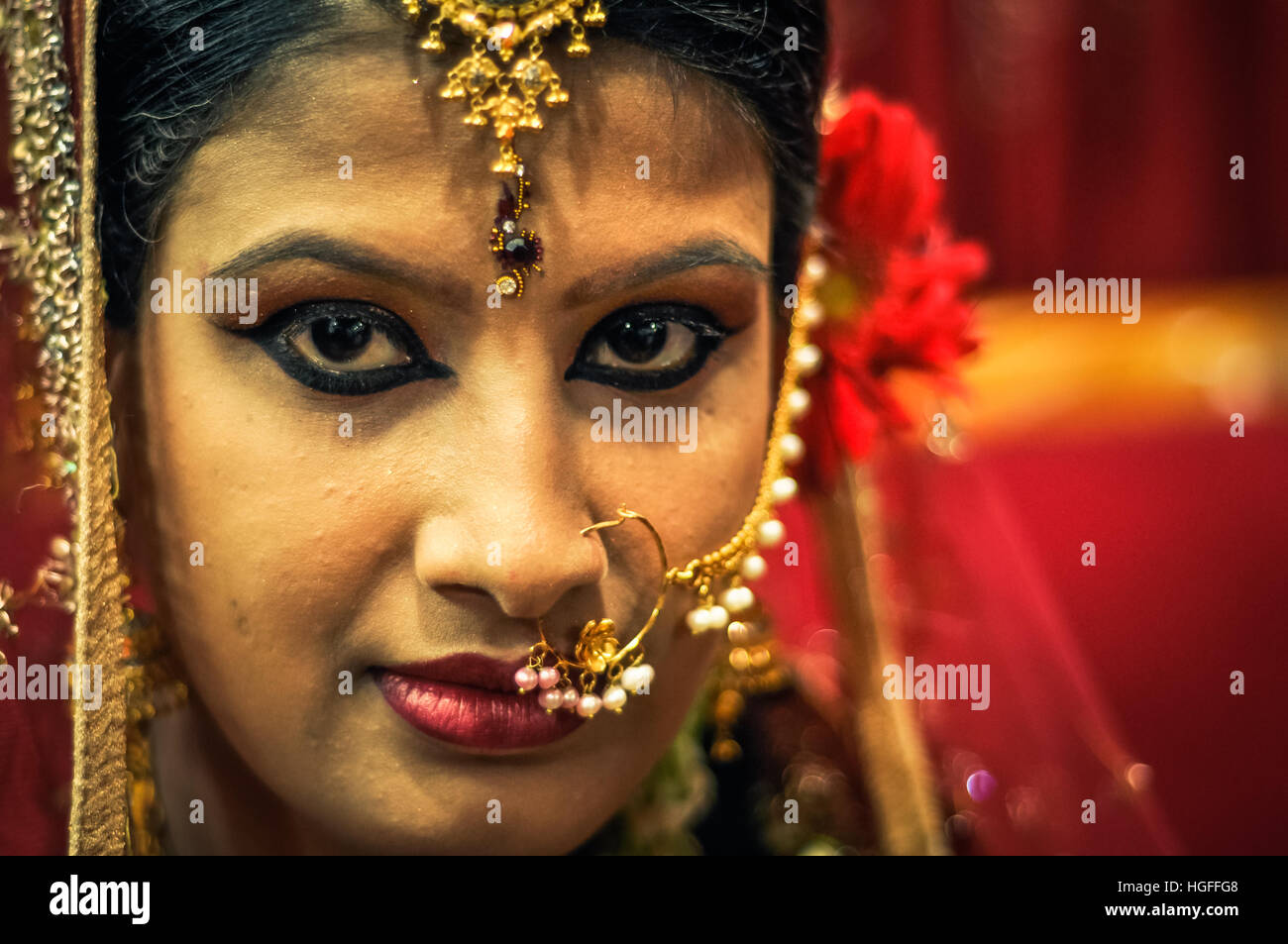 Dhaka, Bangladesh - circa July 2012: Bride with long black braid wears ...