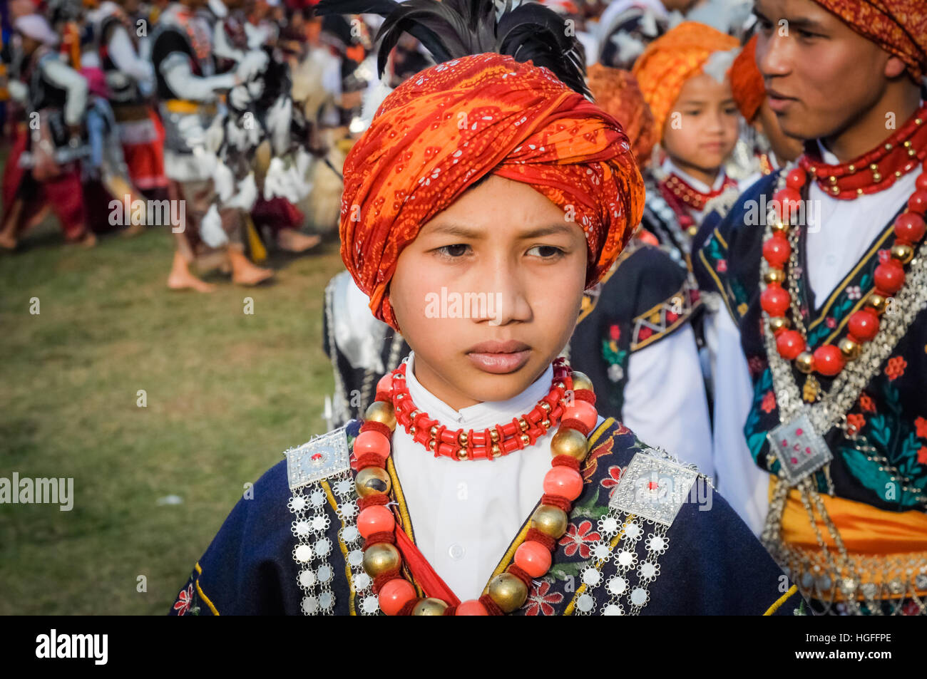 Shillong, Meghalaya - circa April 2012: Young boy wears red turban with ...