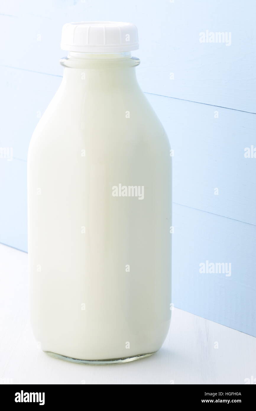 Delicious, nutritious and fresh Quart Milk Bottle Stock Photo - Alamy