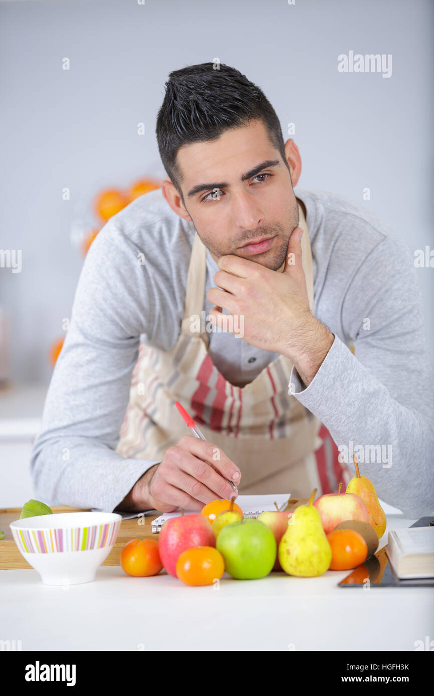 man making food in house Stock Photo - Alamy