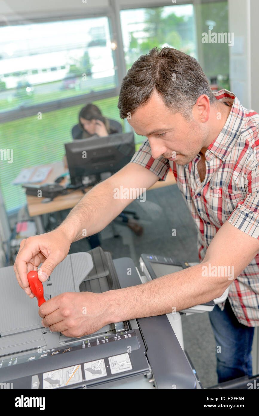 Repairing a printer Stock Photo - Alamy