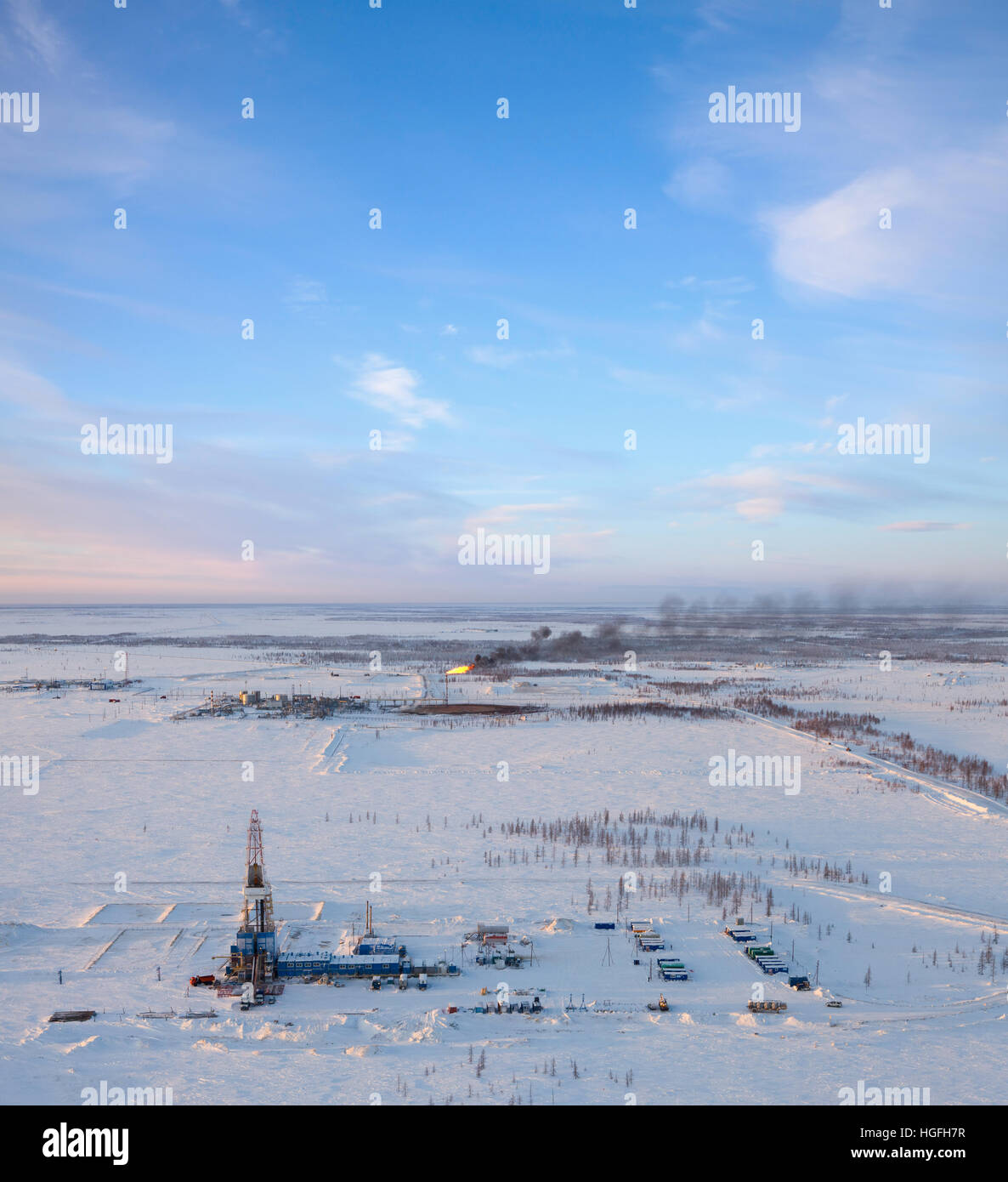 Aerial view of oil rig at an oil field in Western Siberia in the winter ...