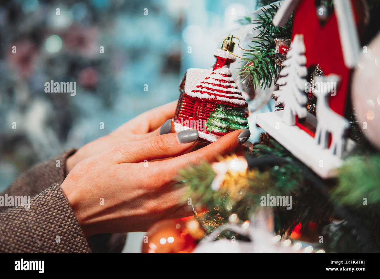 Christmas tree branch with toys Stock Photo - Alamy