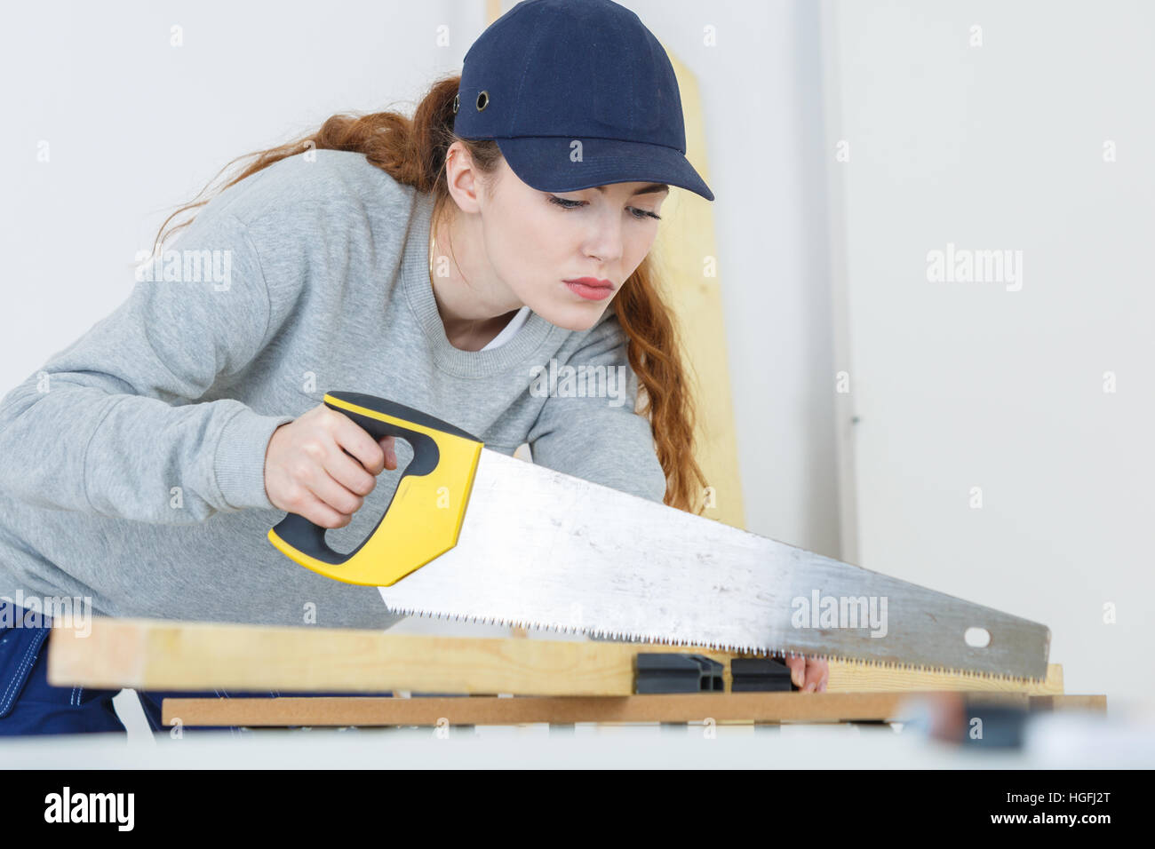 cutting a wood Stock Photo - Alamy