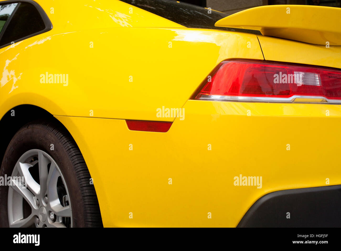 Rear Detail of a Yellow Sports Car Stock Photo - Alamy