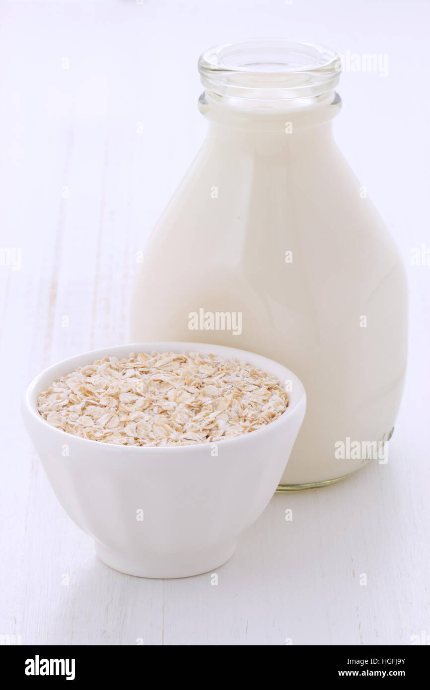 Delicious, nutritious and healthy fresh oats on vintage white wood ...