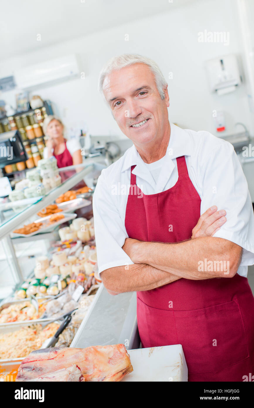 Butcher in his shop Stock Photo - Alamy