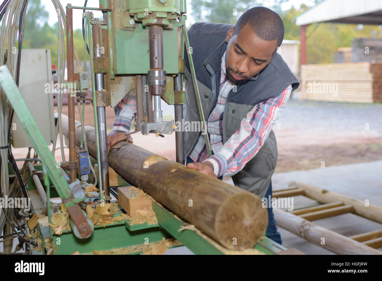 drilling a log Stock Photo - Alamy
