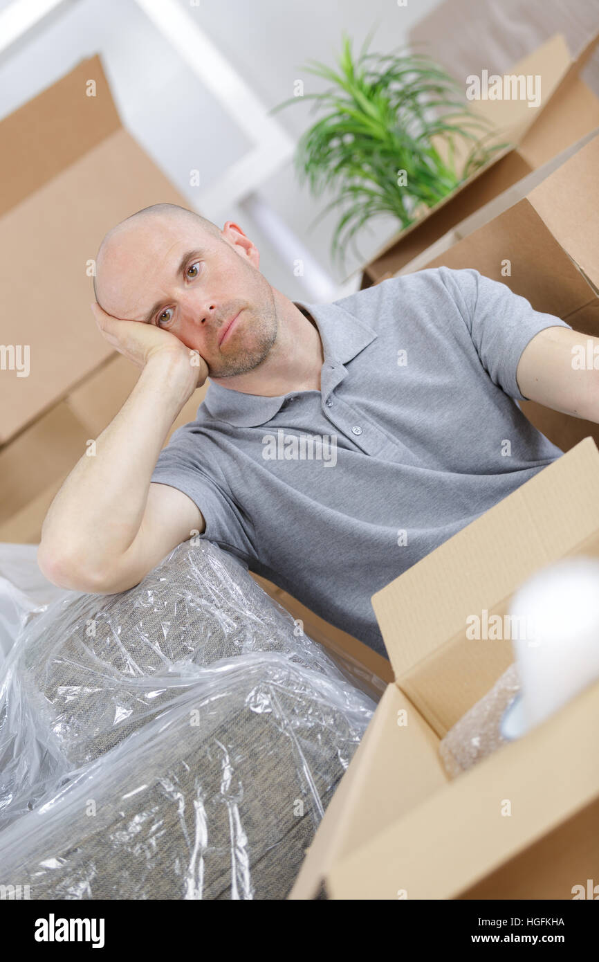 young tired man on moving Stock Photo - Alamy