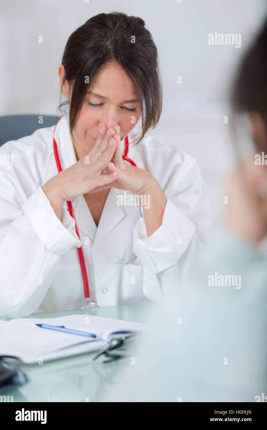 doctor having a thought Stock Photo - Alamy