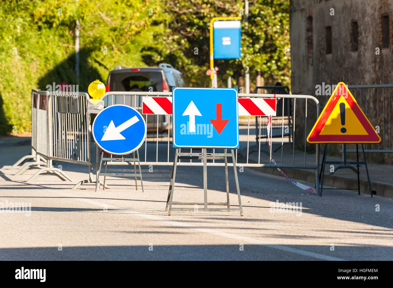 Alternate one-way signal. Before a site of roadworks Stock Photo - Alamy