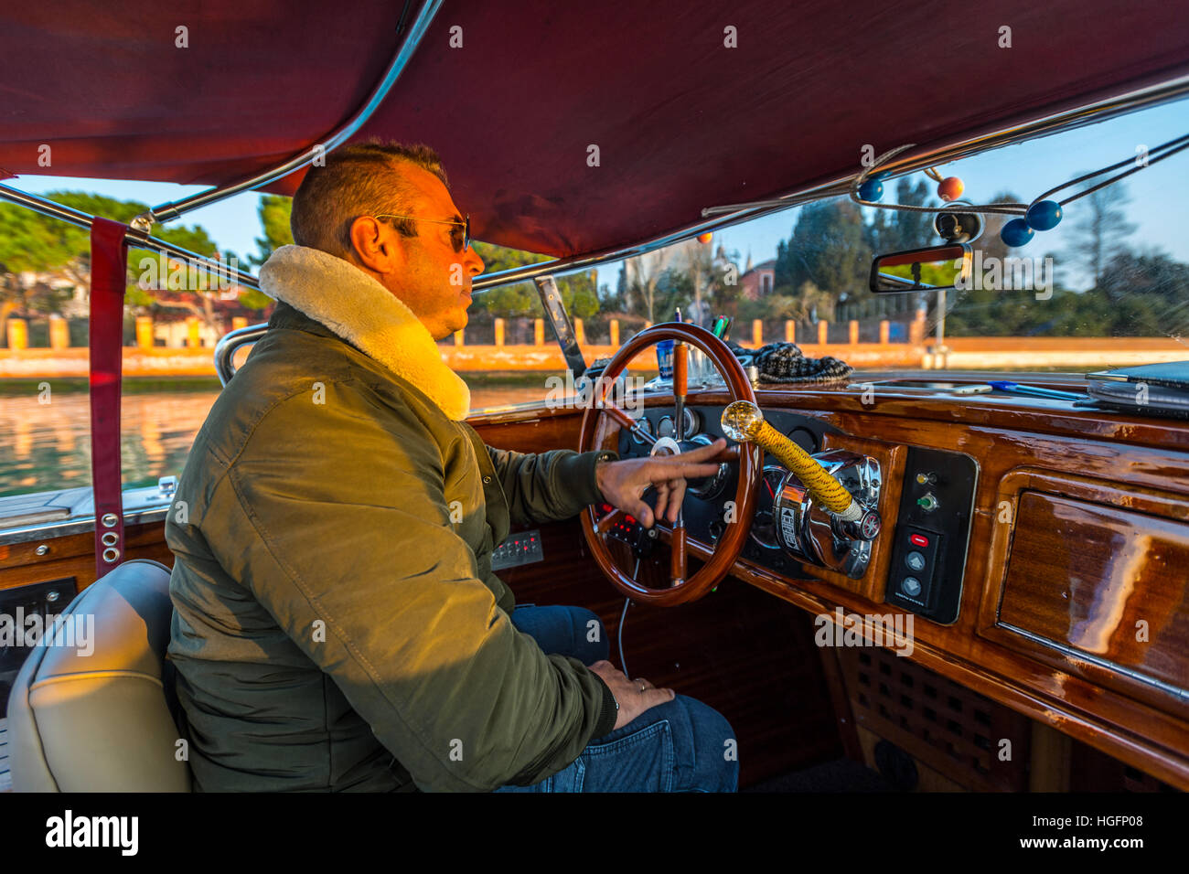Venice water taxi driver hi-res stock photography and images - Alamy