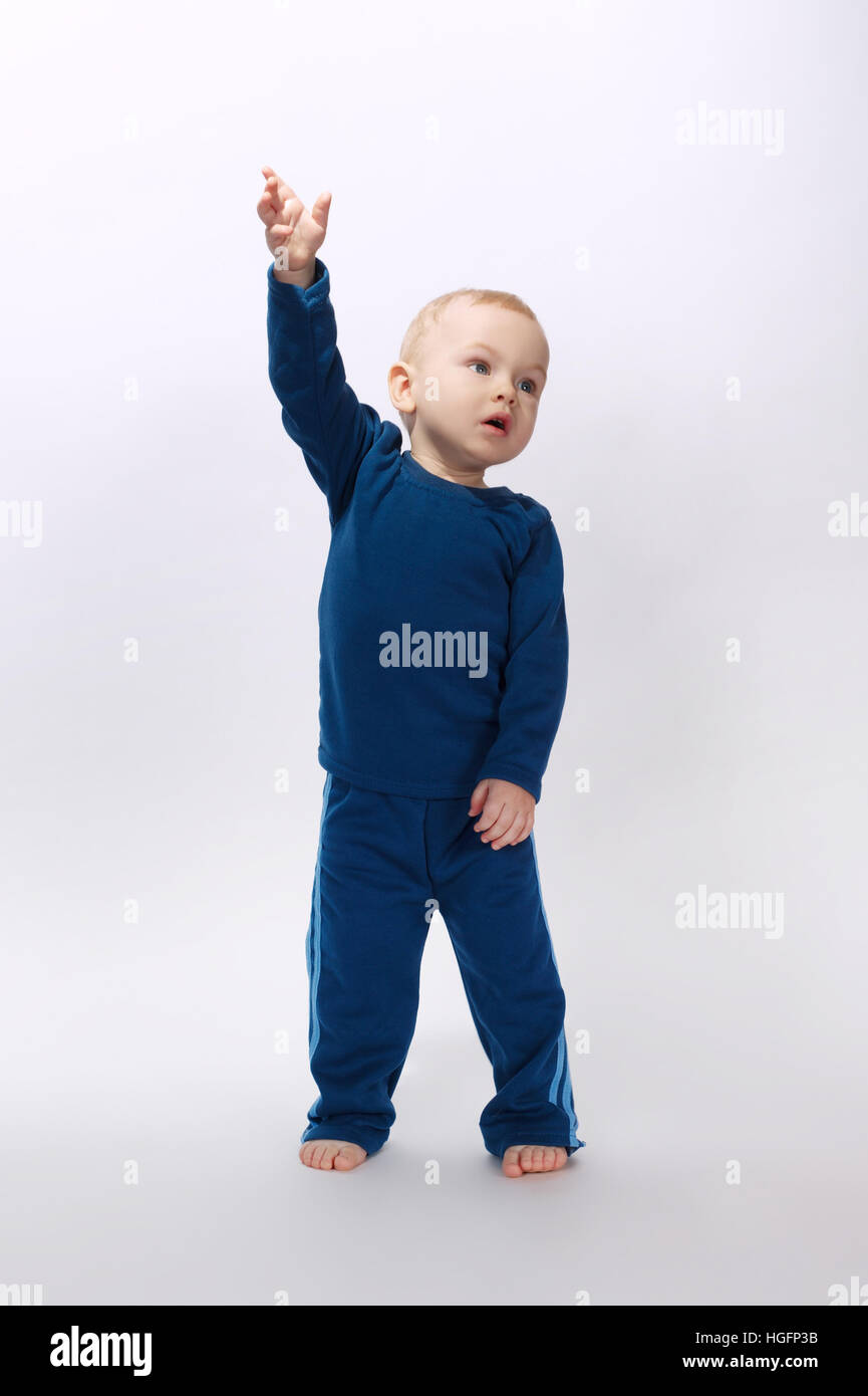 cute little boy points up Stock Photo - Alamy