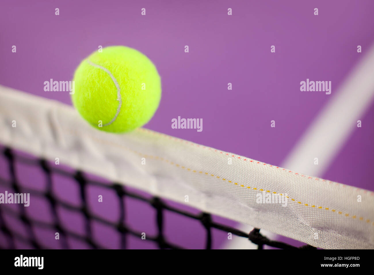 Tennis ball hitting the net Stock Photo - Alamy