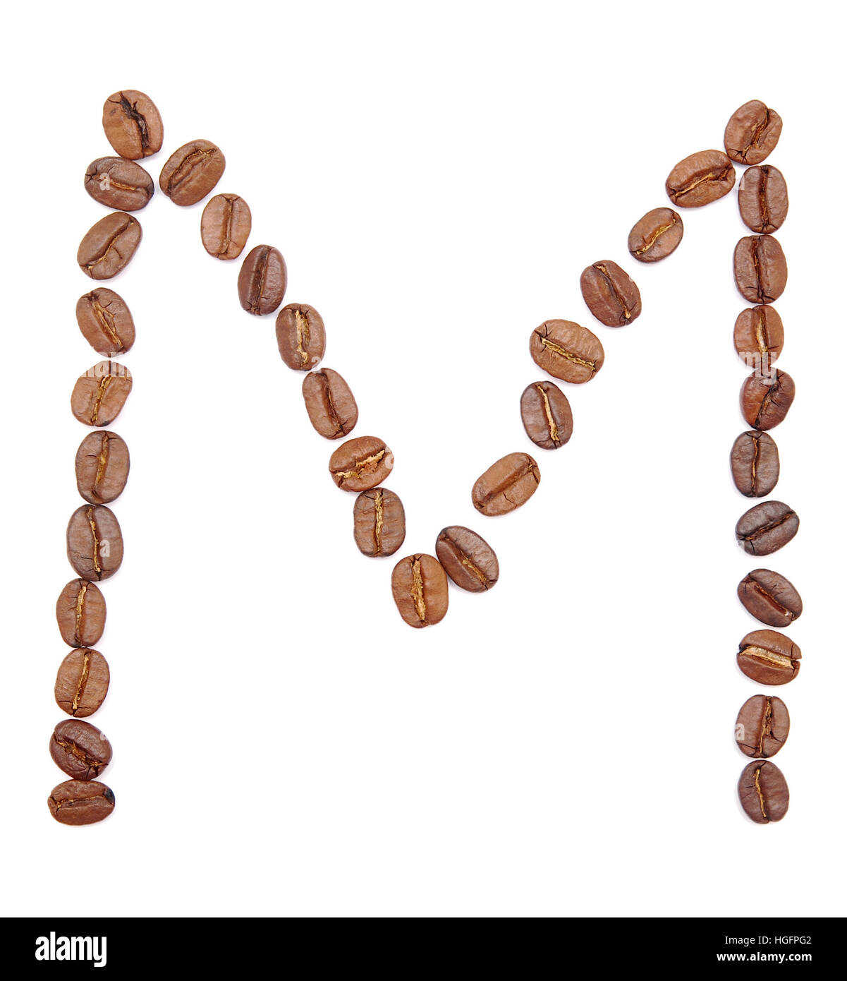 letter M from coffee beans with shadow isolated on white Stock Photo ...