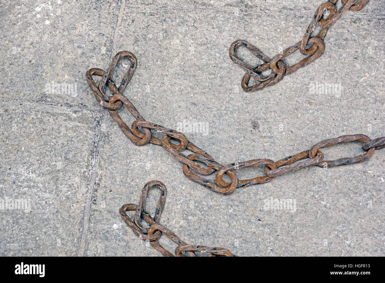 old rust chain on the floor Stock Photo - Alamy