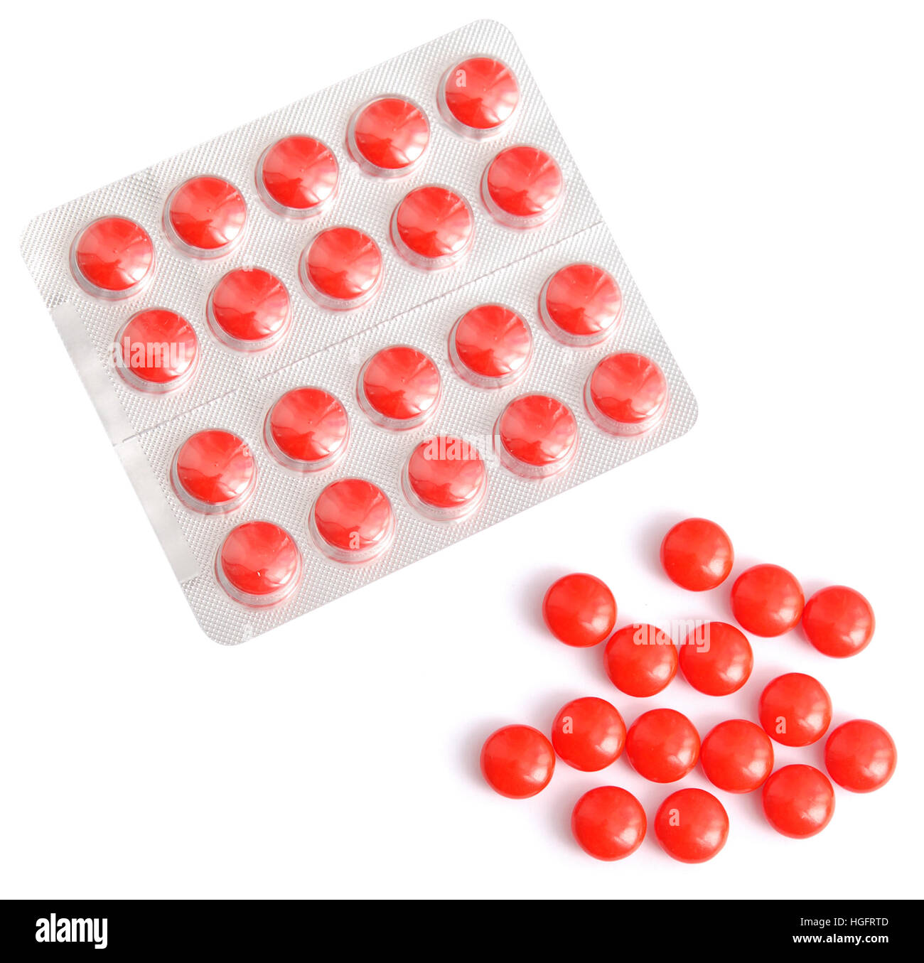 tablets of orange colour isolated on a white background Stock Photo - Alamy