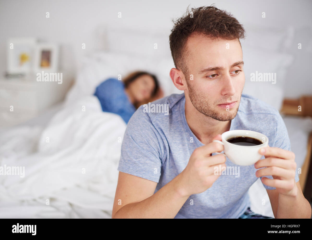 Worried man thinking about the future Stock Photo - Alamy