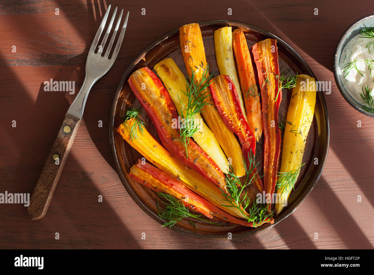 roasted colorful carrots on plate Stock Photo - Alamy