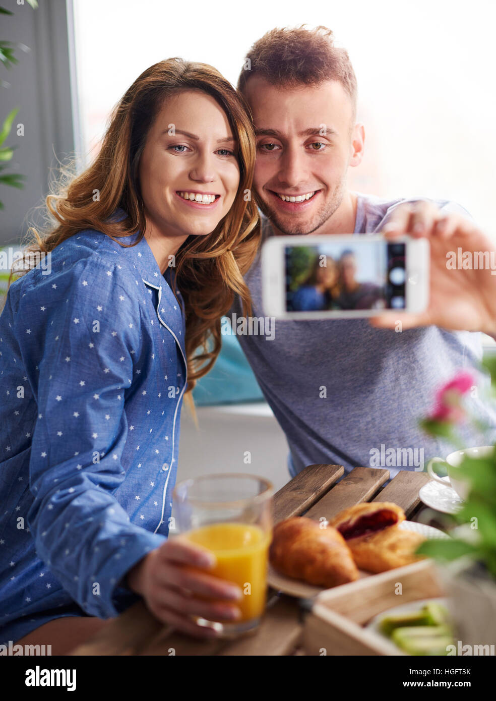 Young couple taking room in hi-res stock photography and images - Alamy