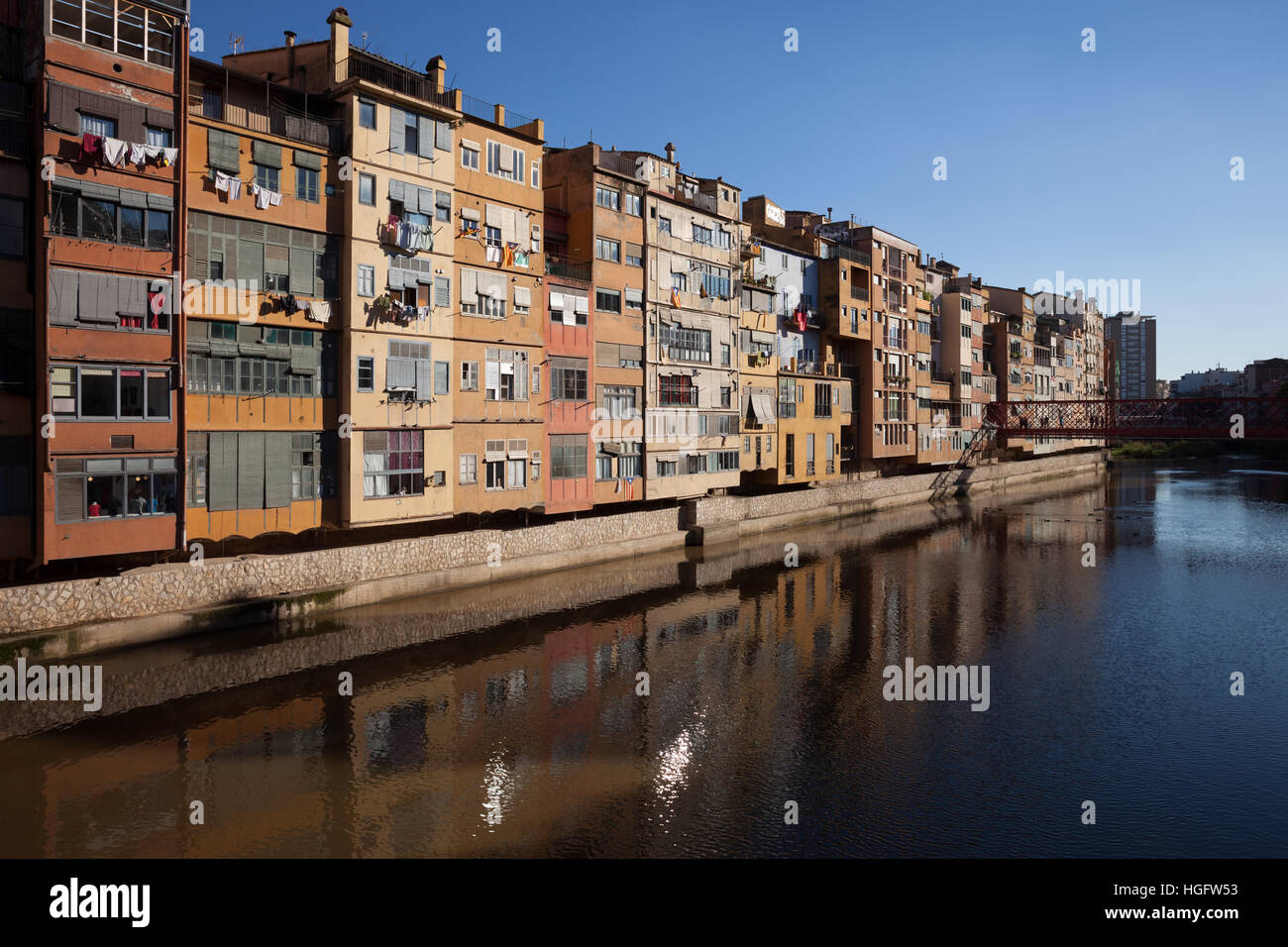 Spain, Catalonia, Girona, city at dusk, old riverside houses along ...