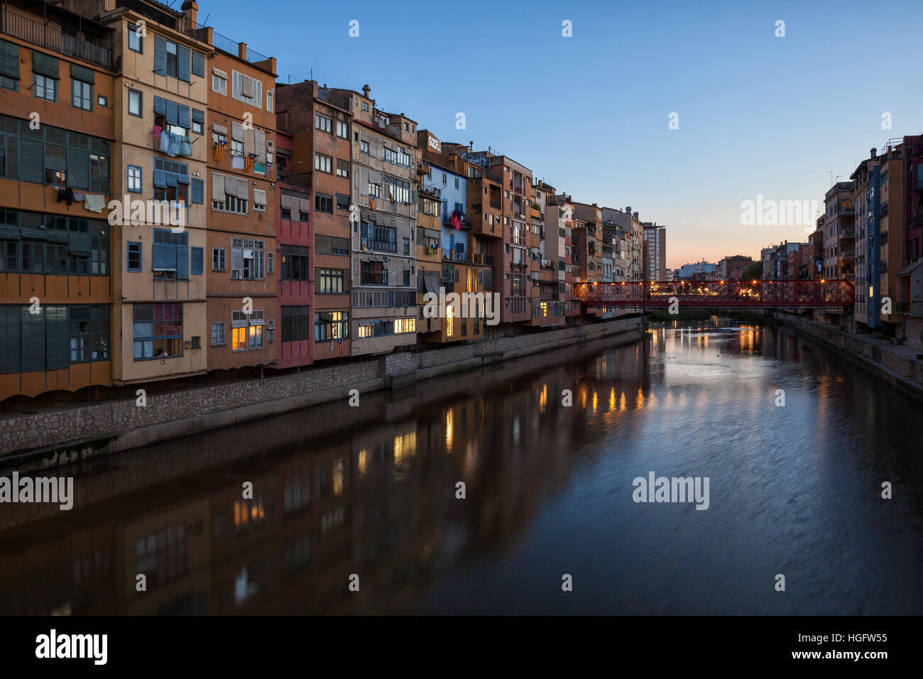 Spain, Catalonia, city of Girona at twilight, houses on River Onyar ...