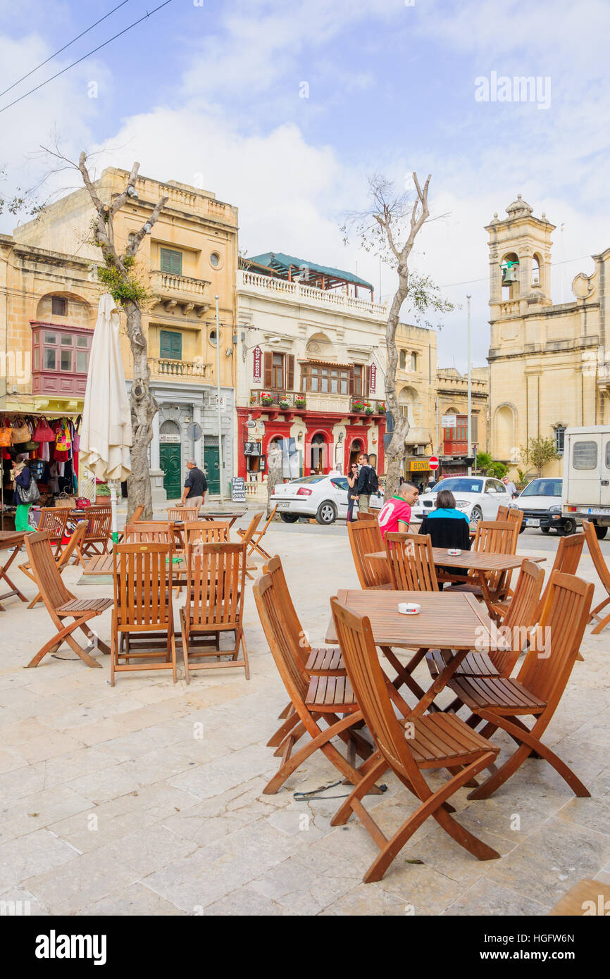 VICTORIA, MALTA - APRIL 11, 2012: Street scene, with locals and ...
