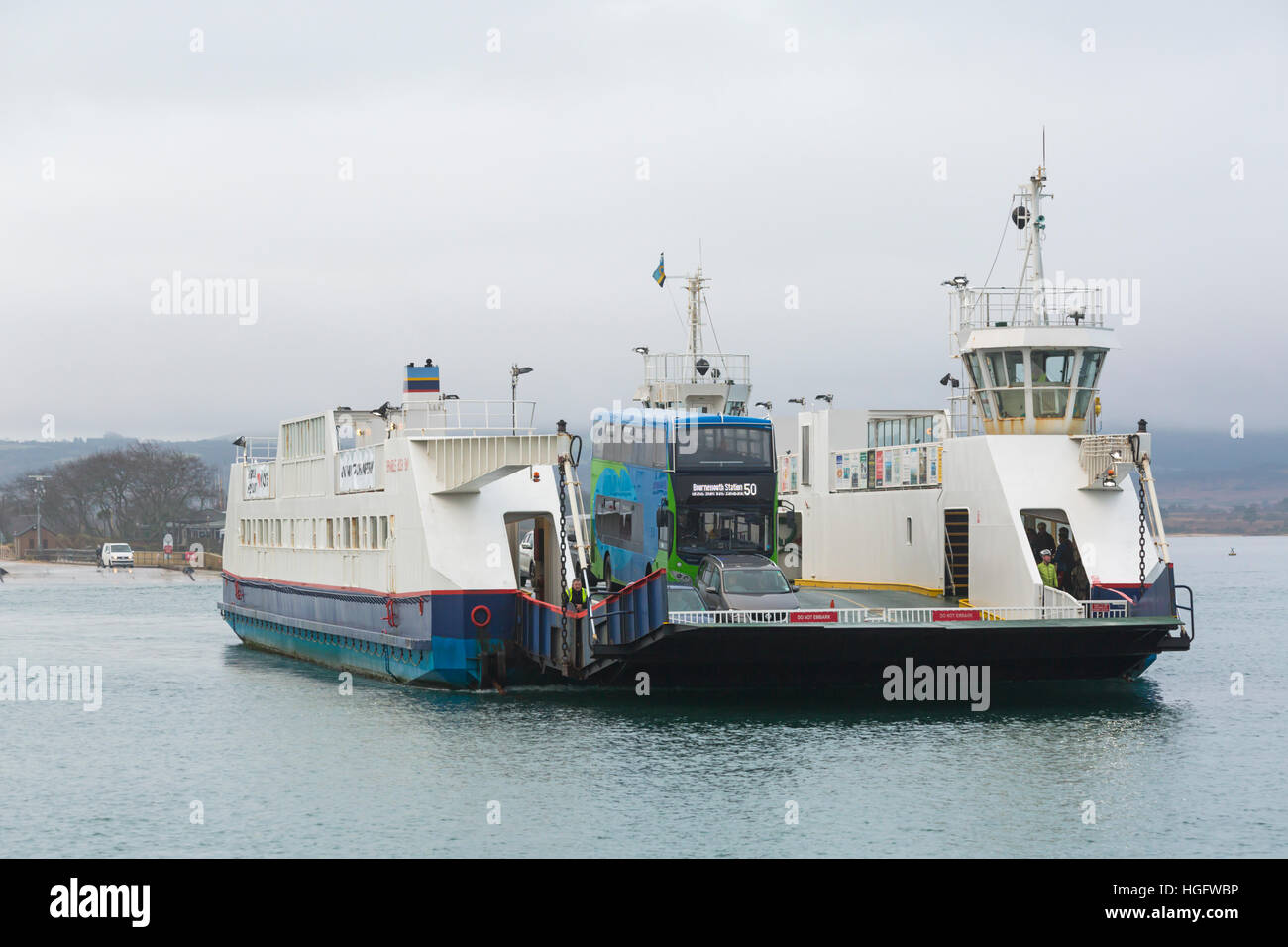 Passengers, cars and no 50 Breezer bus on Bramble Bush Bay chain ferry ...