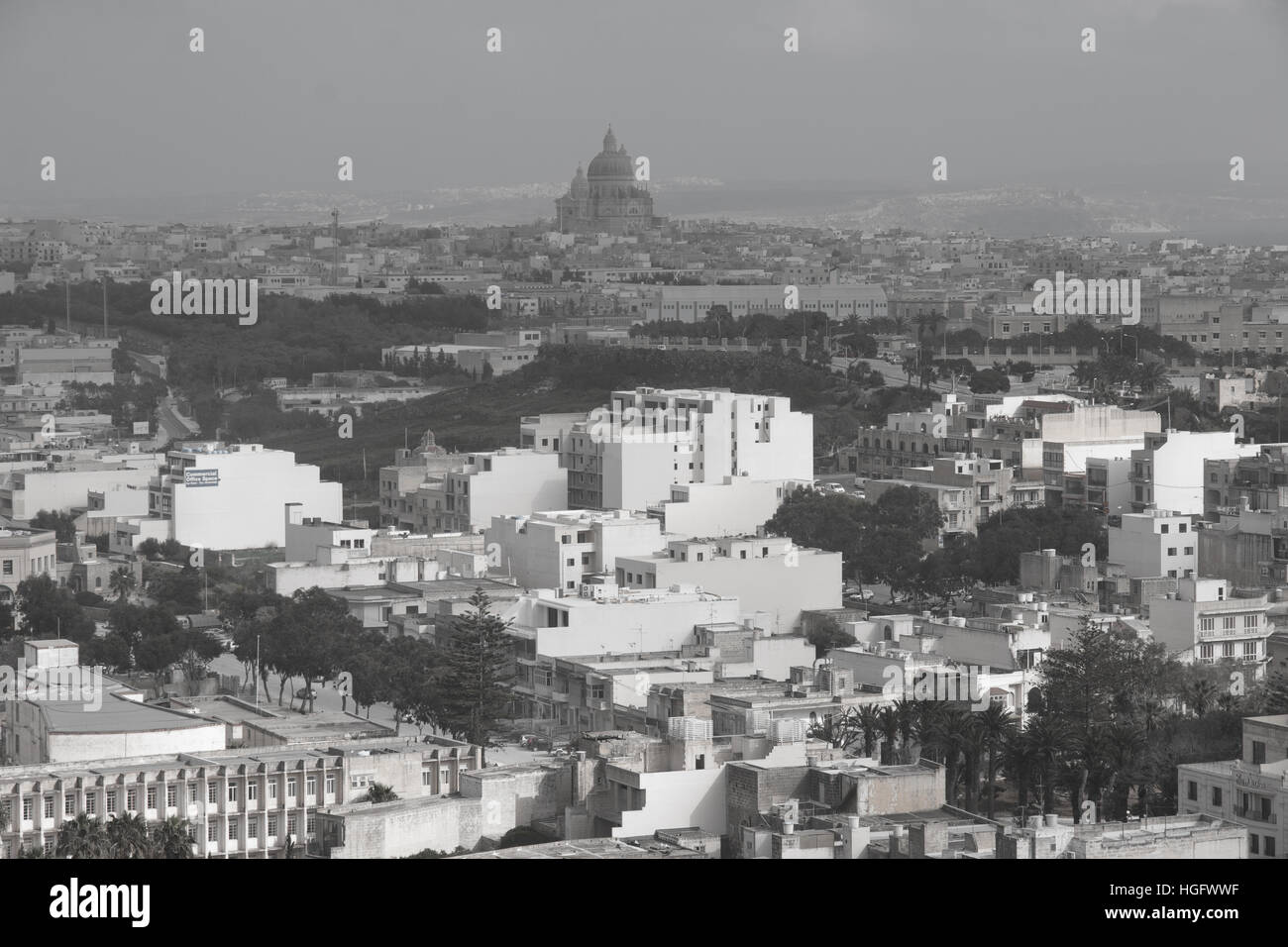 The skyline view of the city of Victoria, and the Xewkija Cathedral ...