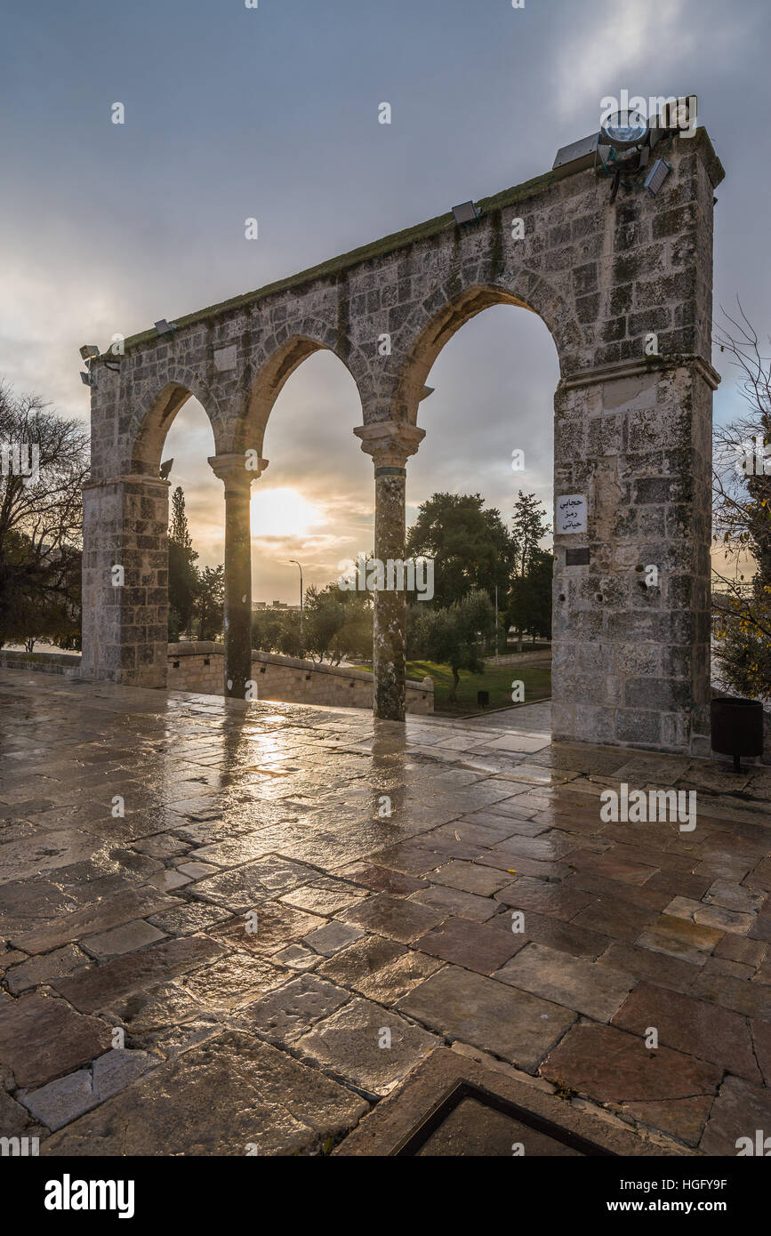 Ancient columns frame buildings, Temple Mount in the Old City of ...