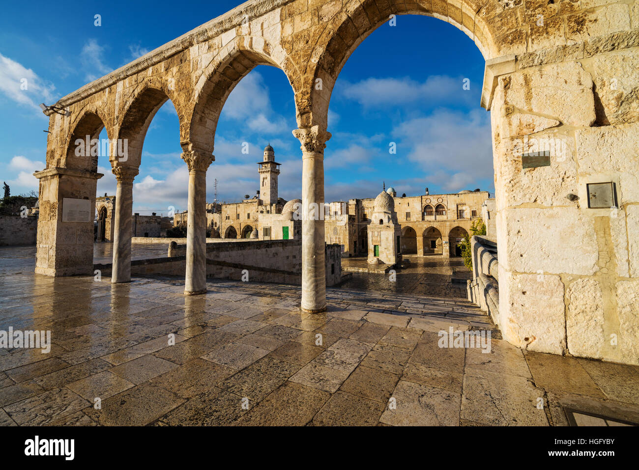 Ancient columns frame buildings, Temple Mount in the Old City of ...