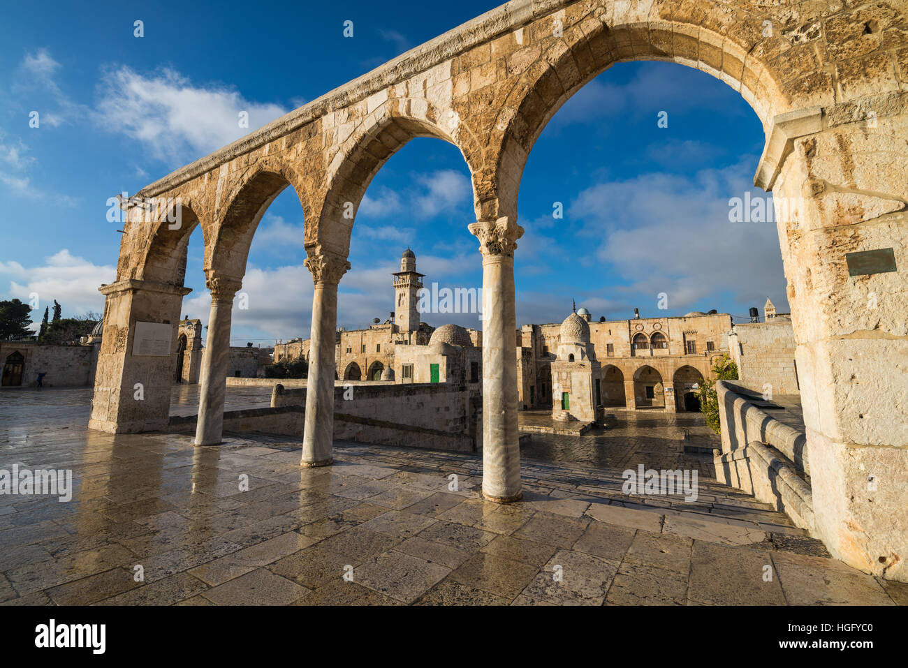 Ancient columns frame buildings, Temple Mount in the Old City of ...