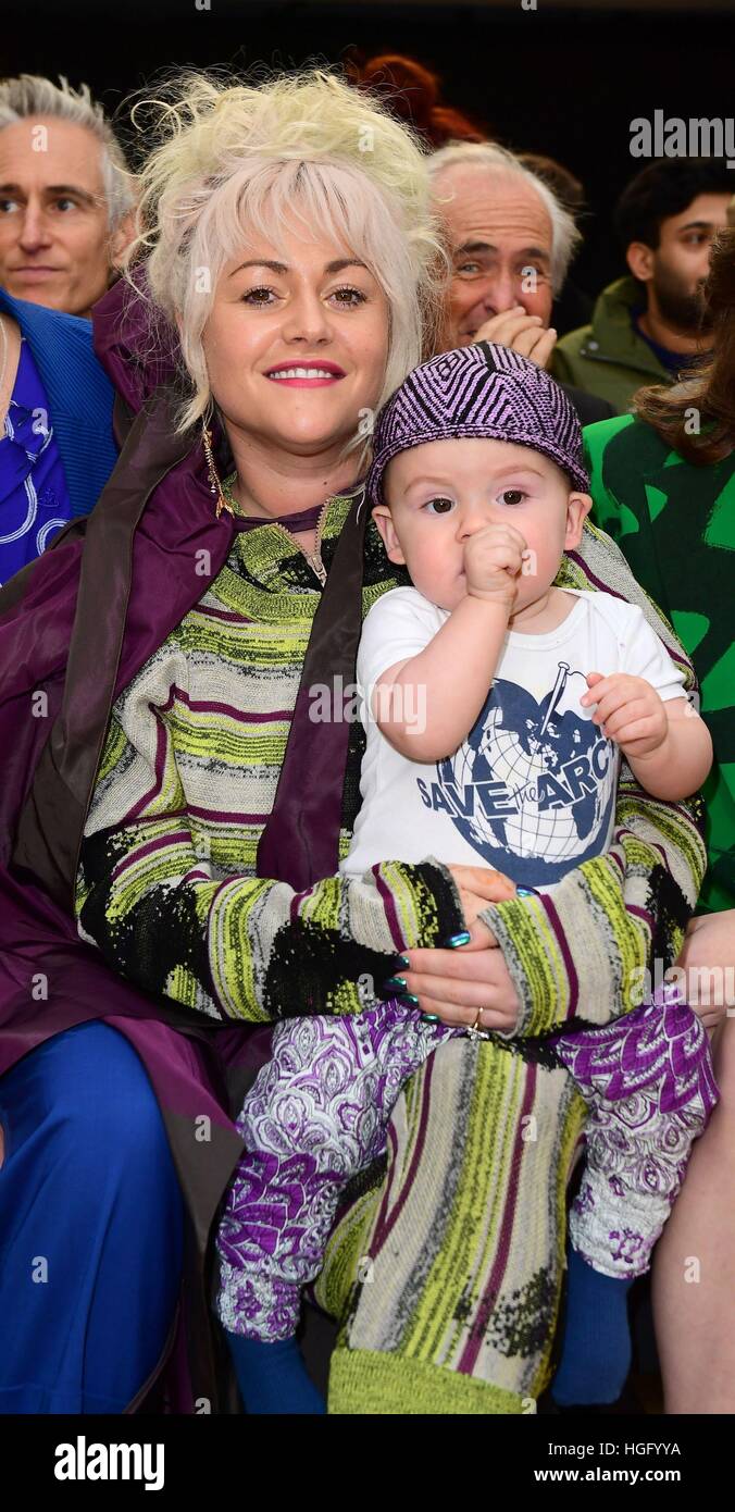 Jaime Winstone and her son Raymond on the front row before the Vivienne ...