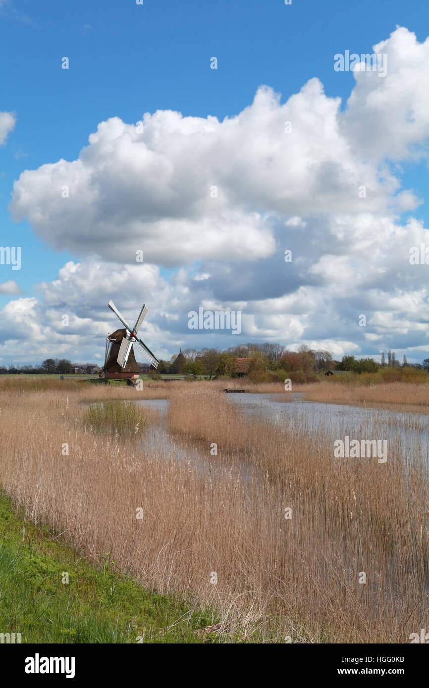 blue sky with clouds over Dutch windmill, Holland Stock Photo - Alamy