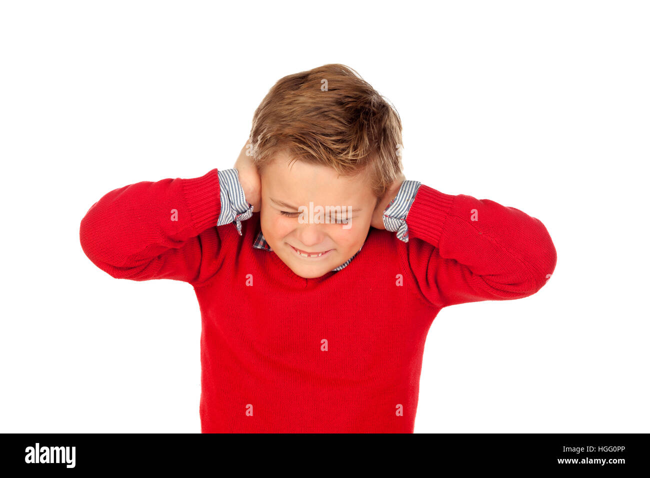 Little kid covering the ears isolated on a white background Stock Photo ...