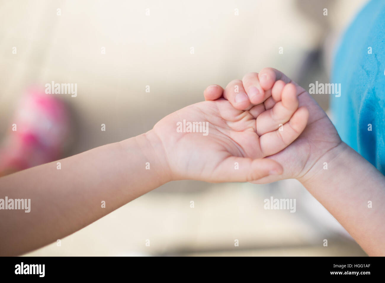 Baby hand hi-res stock photography and images - Alamy