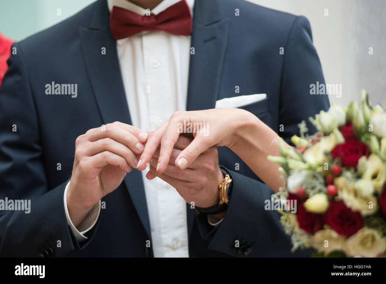 bride and groom are changing rings on wedding ceremony Stock Photo - Alamy