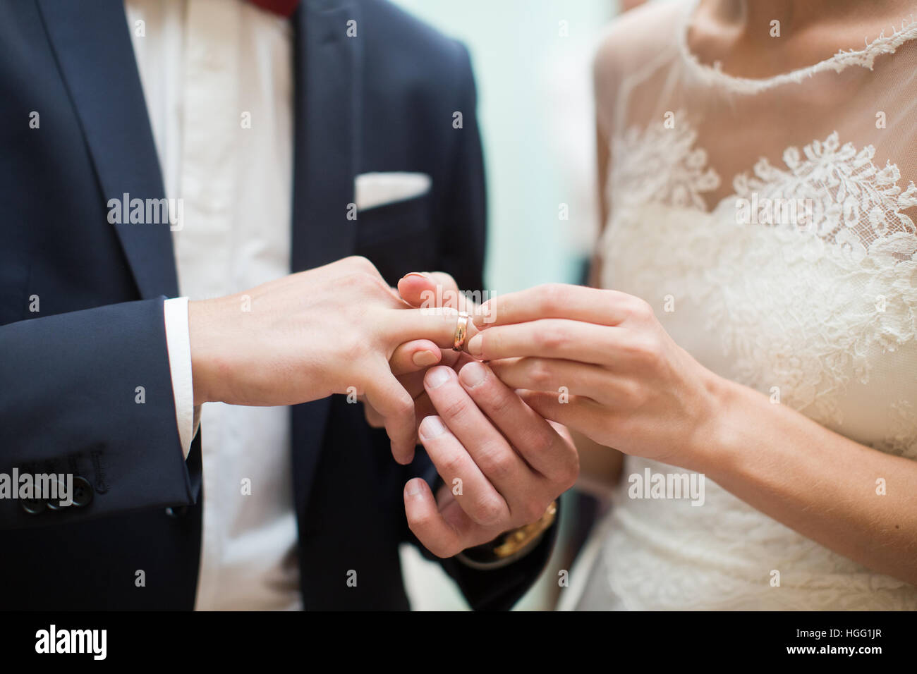 bride and groom are changing rings on wedding ceremony Stock Photo - Alamy