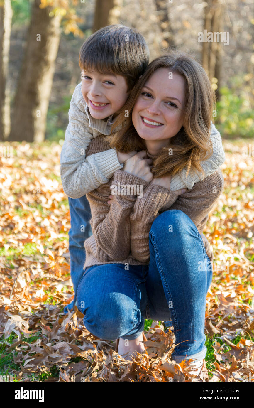 Mother and autistic son in the park. Child needs occupational, speech ...