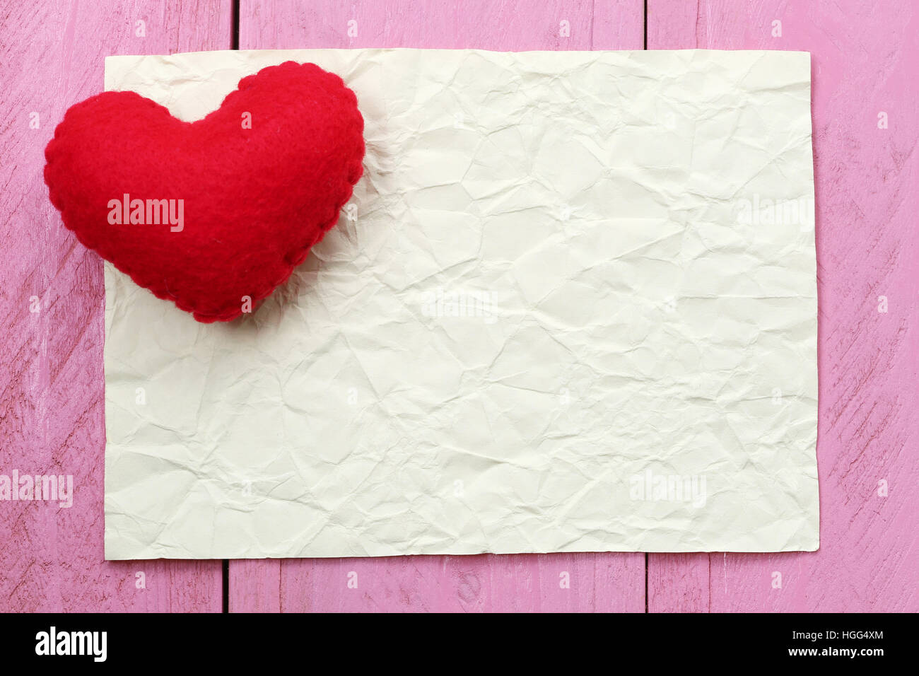 Red heart placed on paper note of empty for input text or message in ...