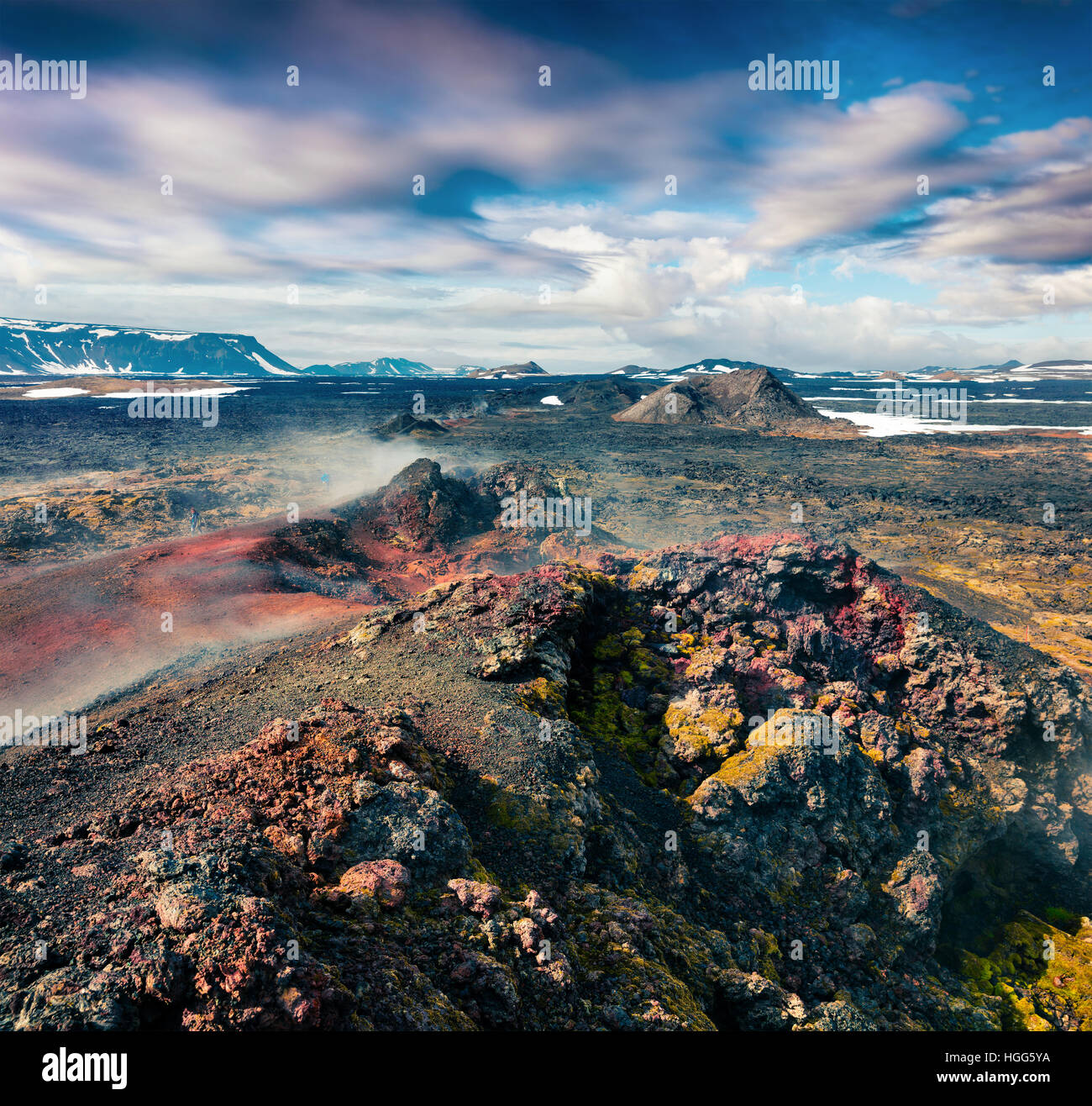Fields of steamy waters in the Krafla volcano. Colorful exotic ...